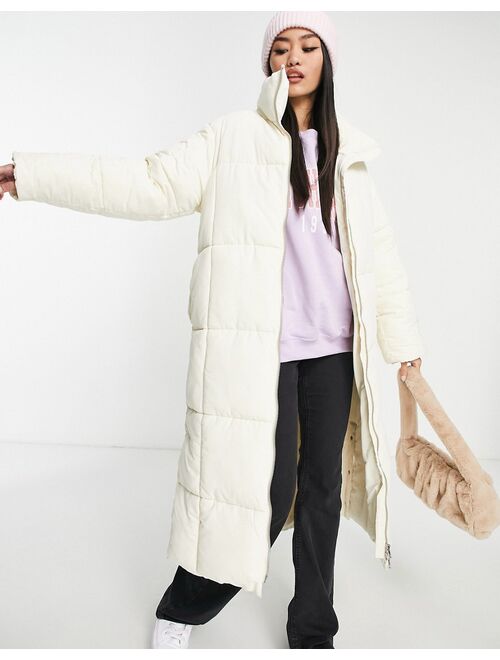 Buy Monki recycled long quilted coat in beige online | Topofstyle